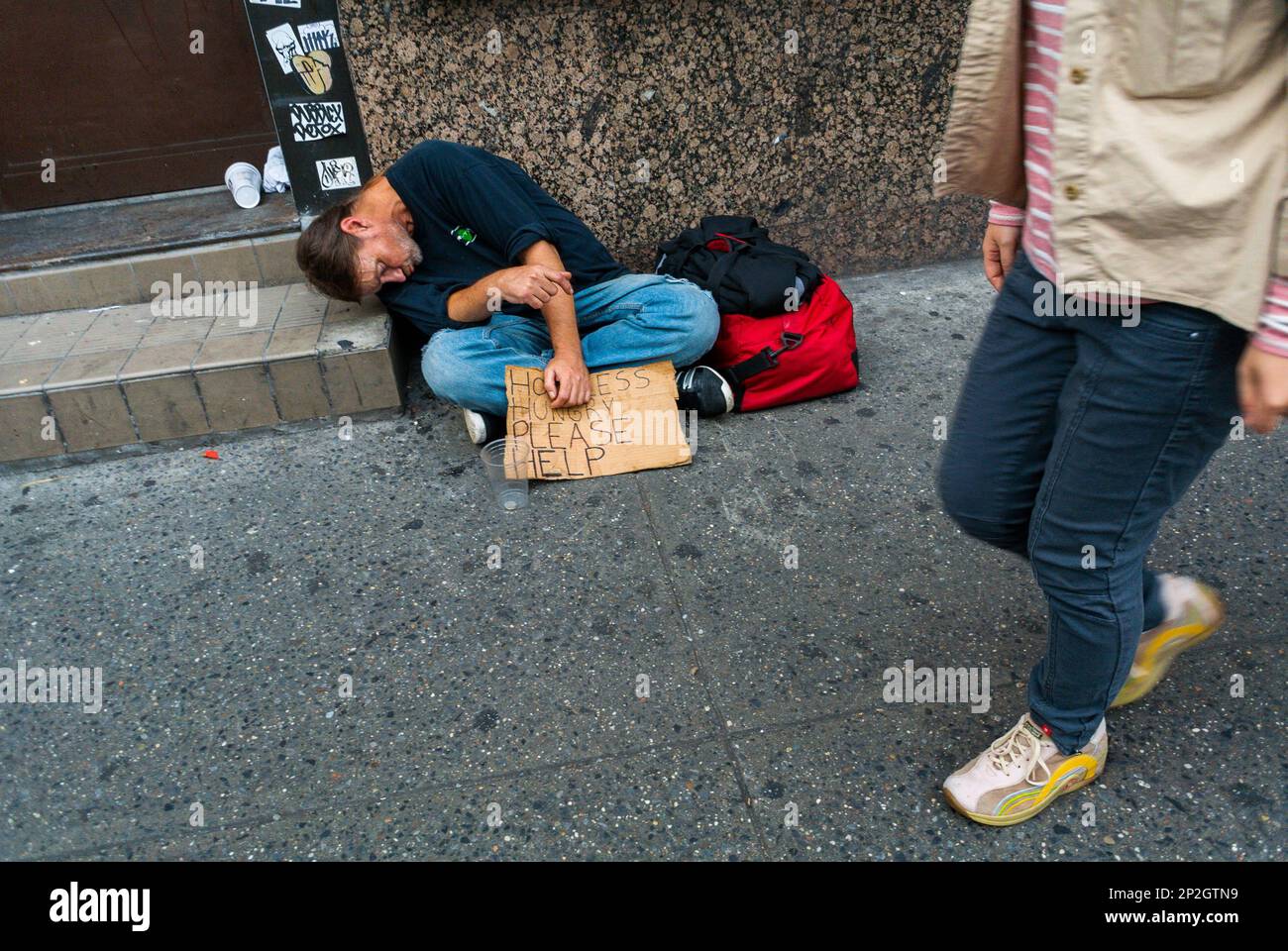 New York City, NY, USA, Homeless man Sleeping on Sidewalk on Busy ...
