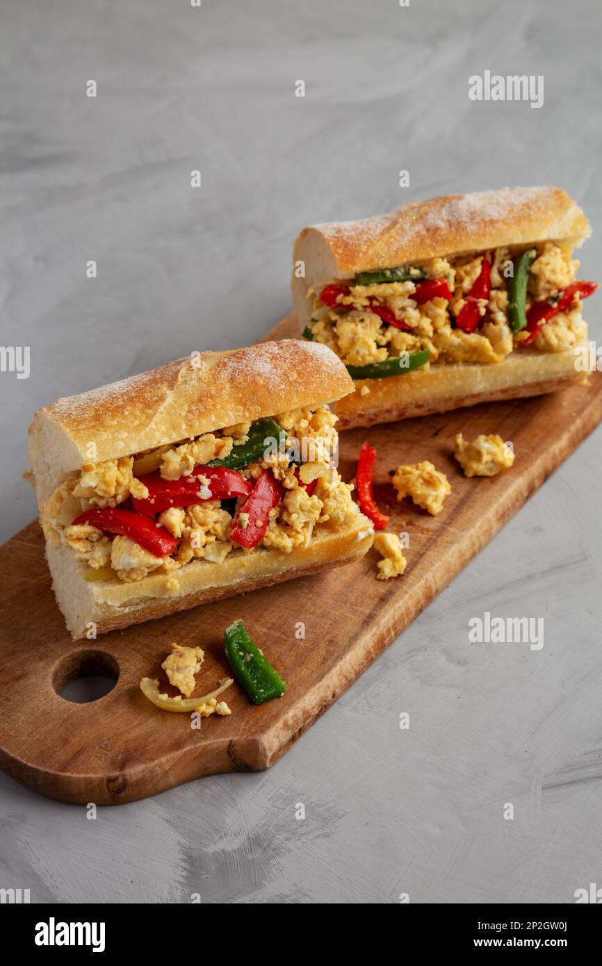 Homemade Easter Pepper and Egg Sandwich on a rustic wooden board, side ...