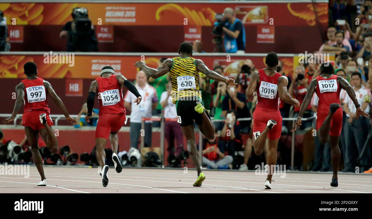Jamaica's Usain Bolt centre, crosses the finish line to win the gold ...