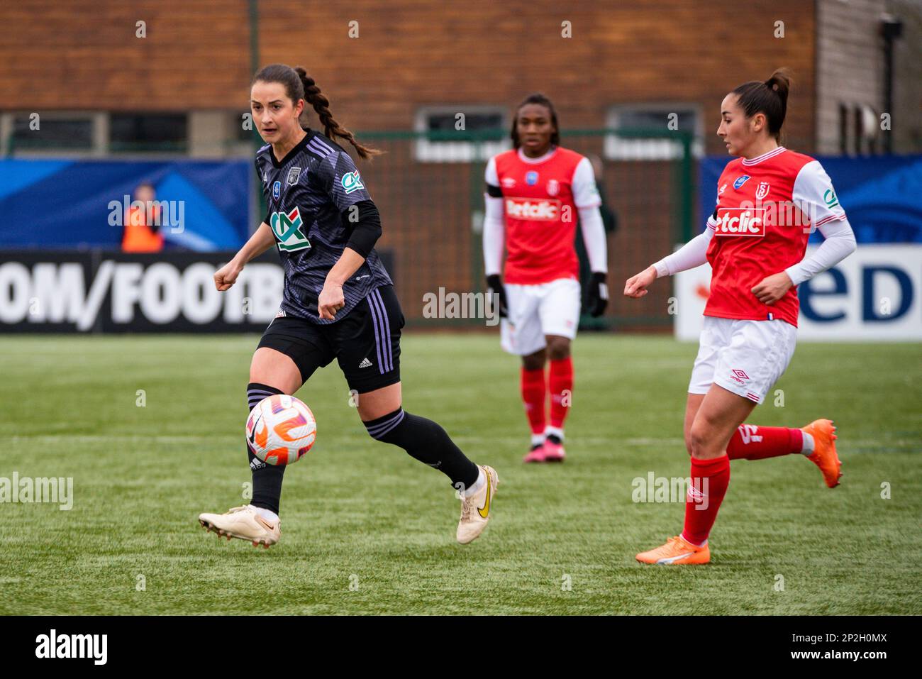 Sara Dabritz of Olympique Lyonnais and Sonia Ouchene of Stade de Reims ...