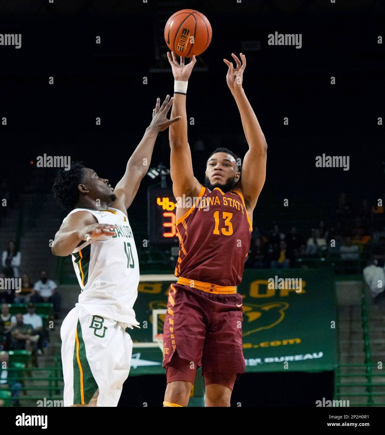 Iowa State guard Jaren Holmes (13) scores on a three-point basket ...