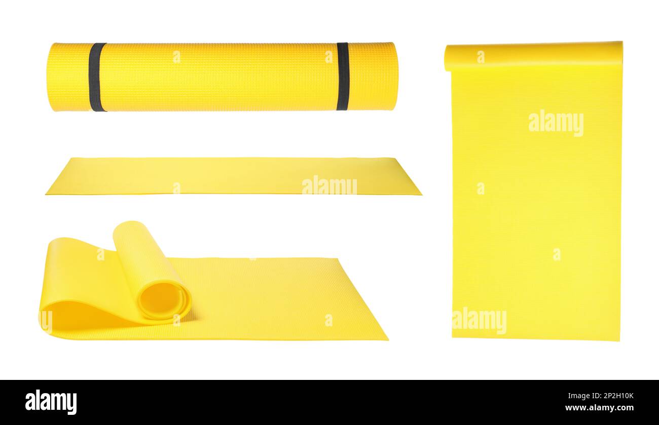 Set with yellow camping mats on white background Stock Photo - Alamy