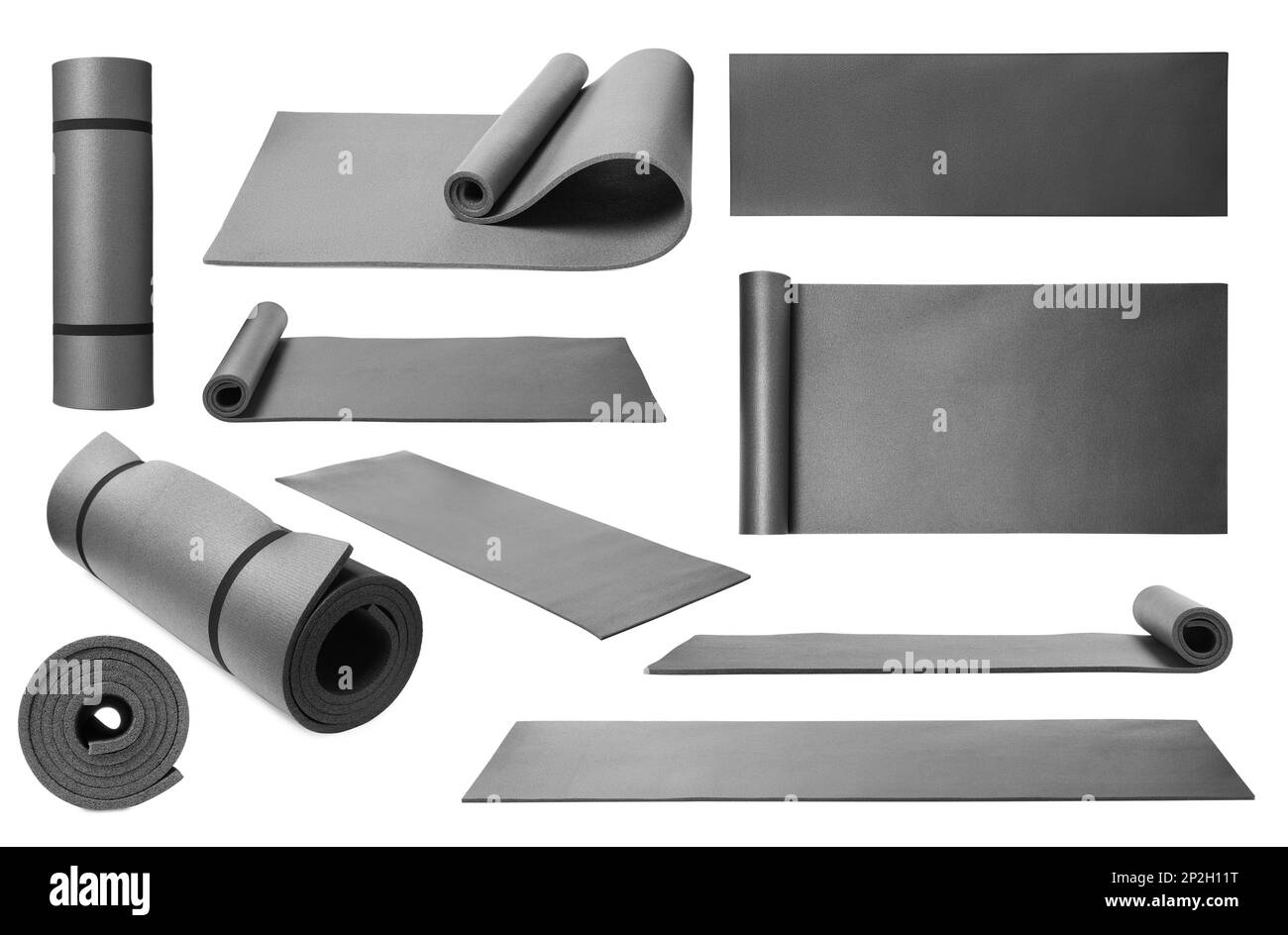 Set with grey camping mats on white background Stock Photo - Alamy