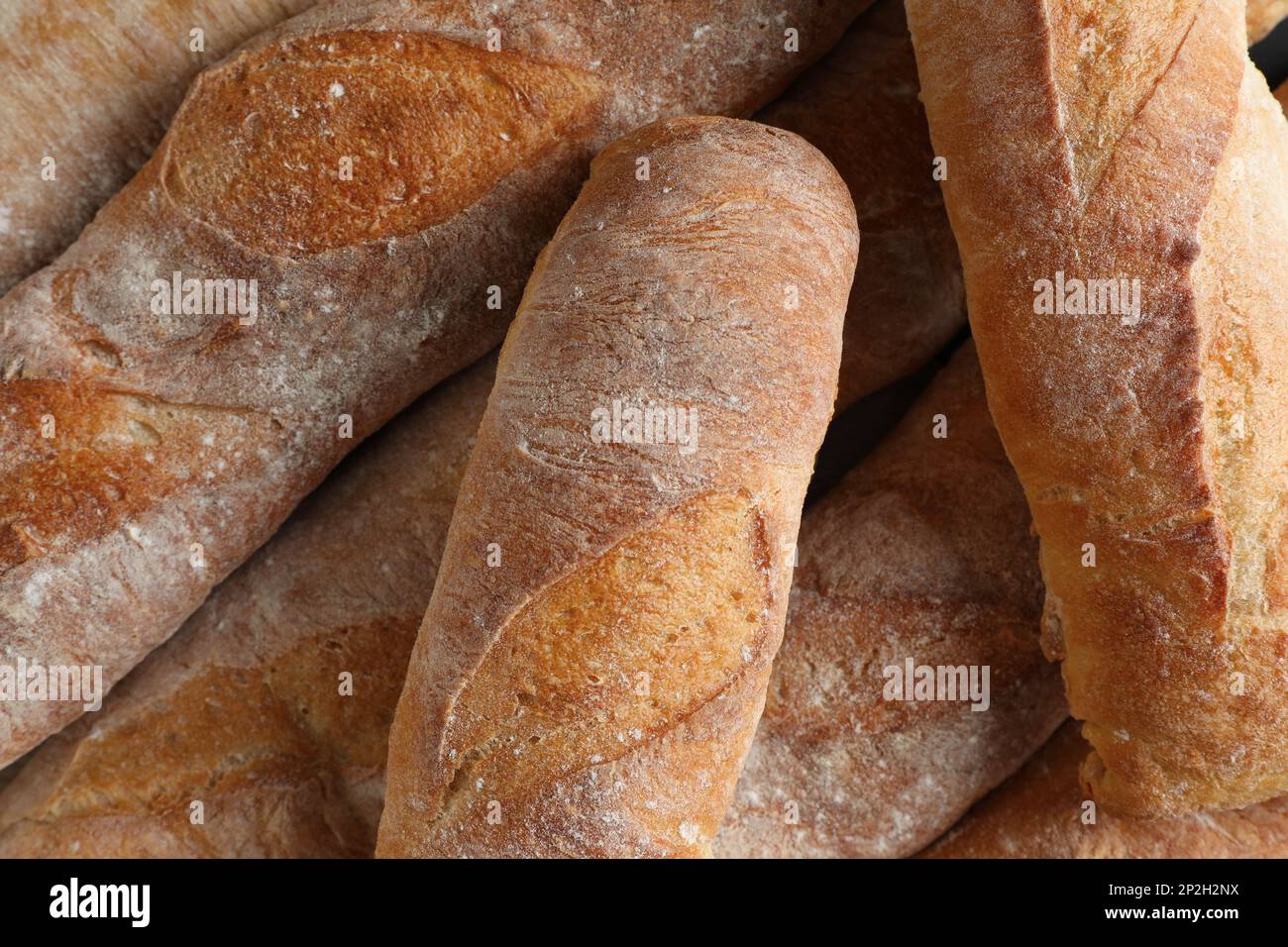 Crispy French baguettes as background, top view. Fresh bread Stock ...