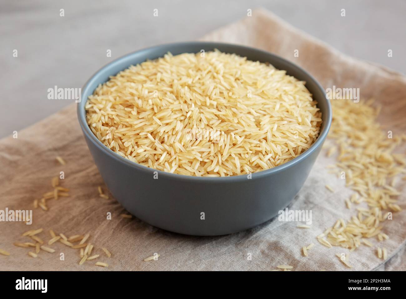 Dry Organic Indian Basmati Rice in a Bowl on a gray background, side ...