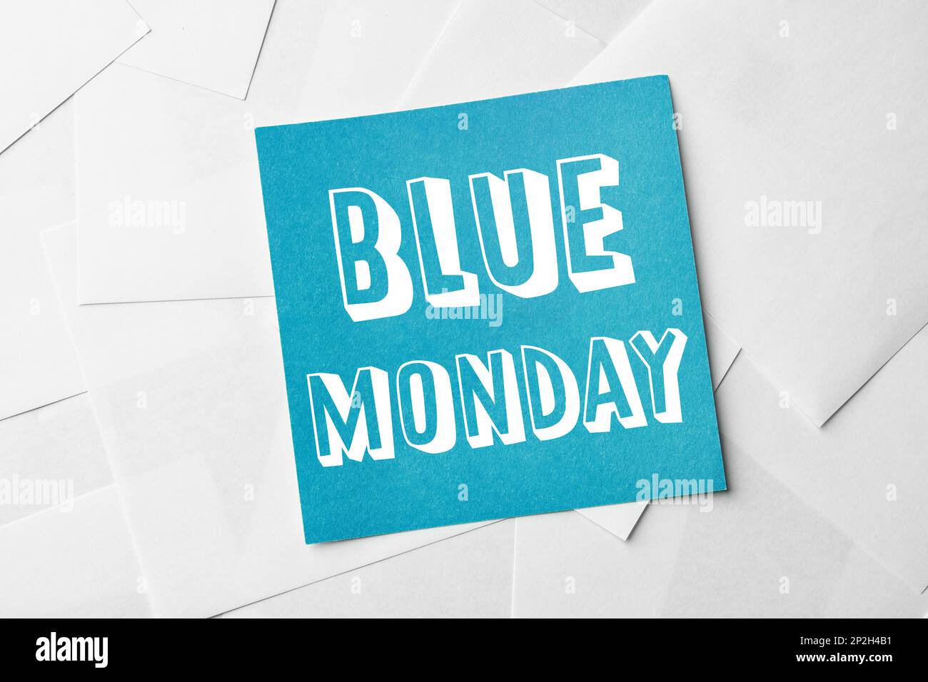 Note with phrase Blue Monday on paper sheets, top view Stock Photo - Alamy