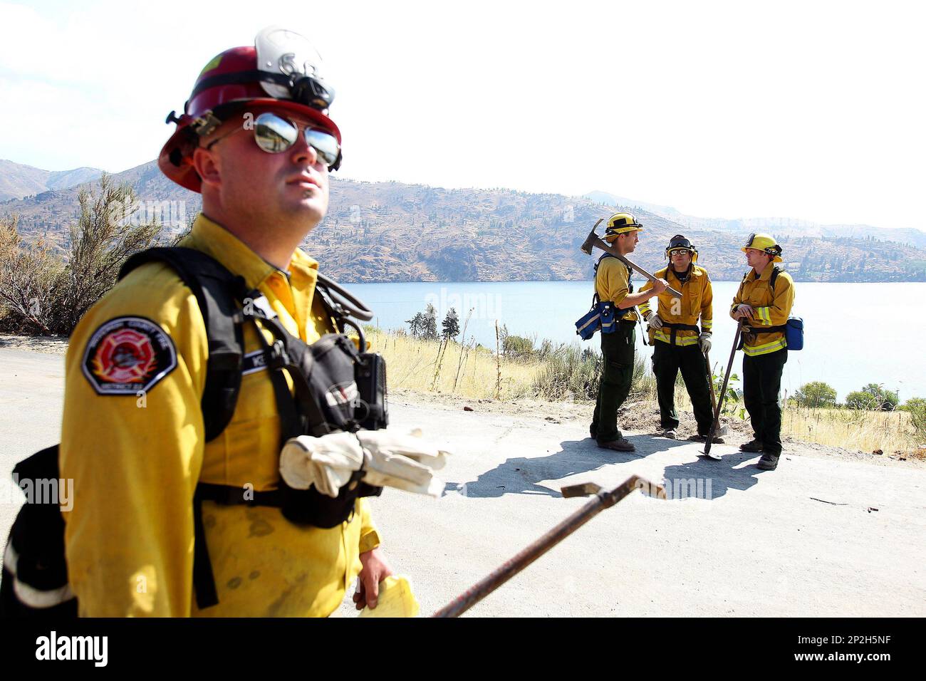 Snohomish County firefighters, from left to right, Capt. Jason Kestle ...