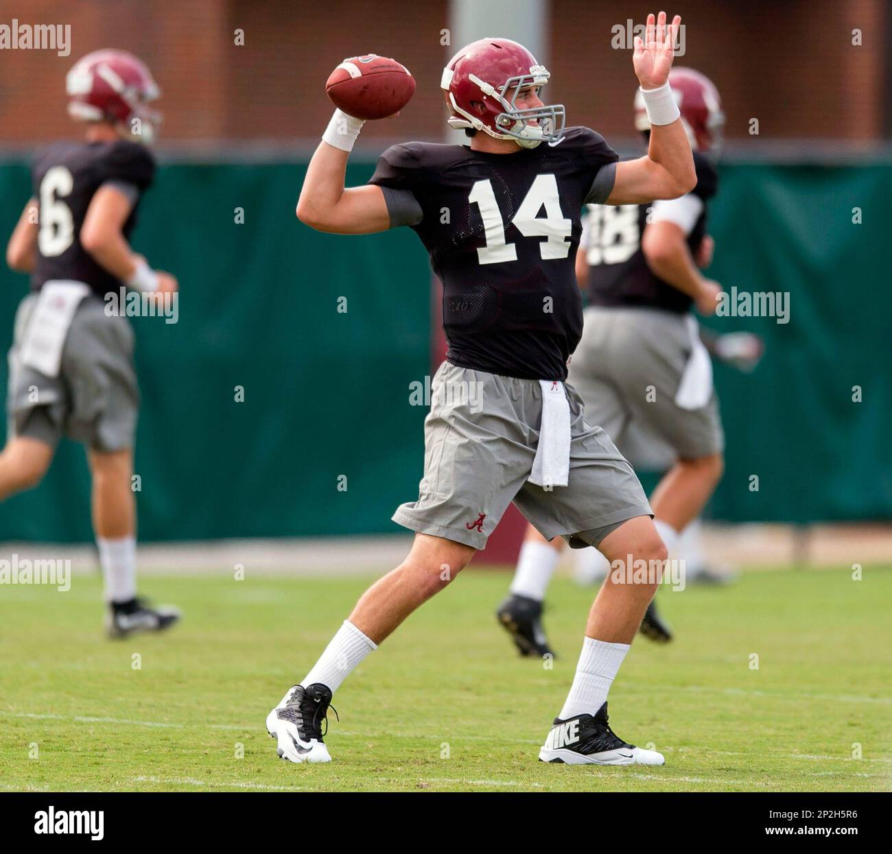 Alabama quarterback Jake Coker (14) works through drills during ...