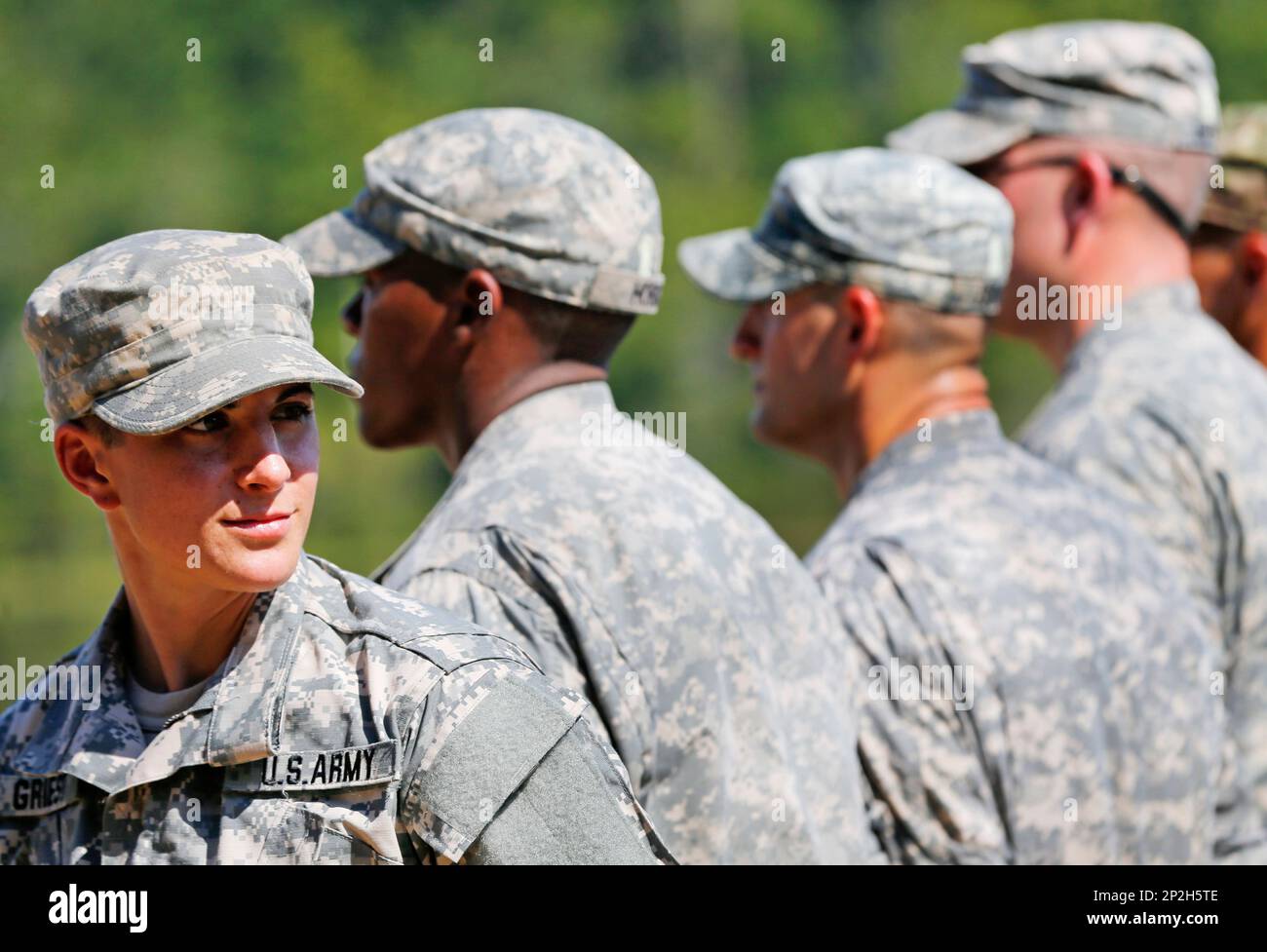 U.S. Army Capt. Kristen Griest, left, of Orange, Conn., stands in ...