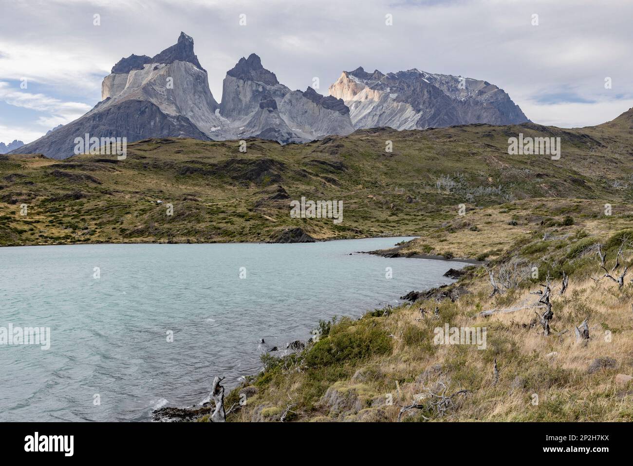 Impressive mountains and a lake with turquoise water at Torres del ...