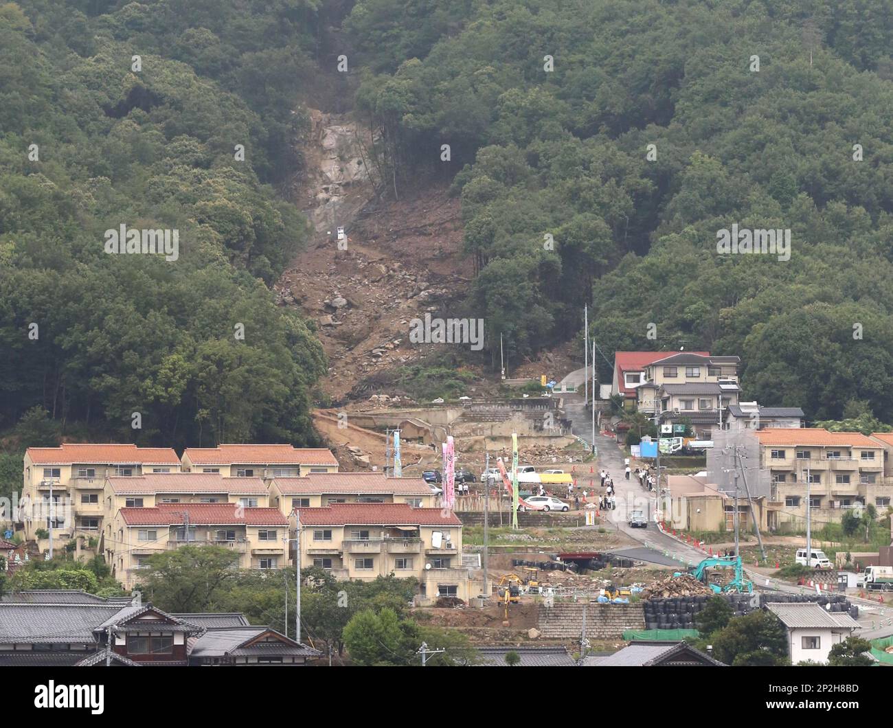 A photo shows the scars left behind by debris flows, which hit ...