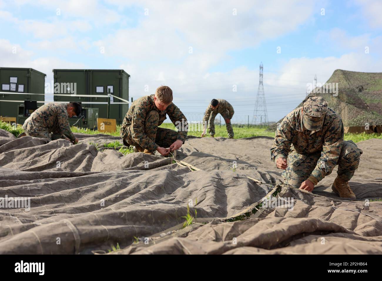 U.S. Marines with I Marine Expeditionary Force Information Group tie ...