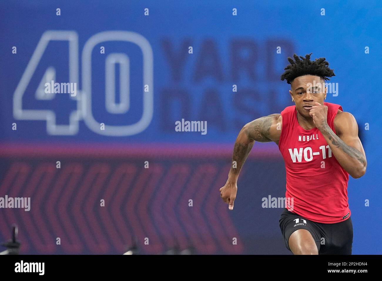 Houston wide receiver Tank Dell runs the 40-yard dash at the NFL ...
