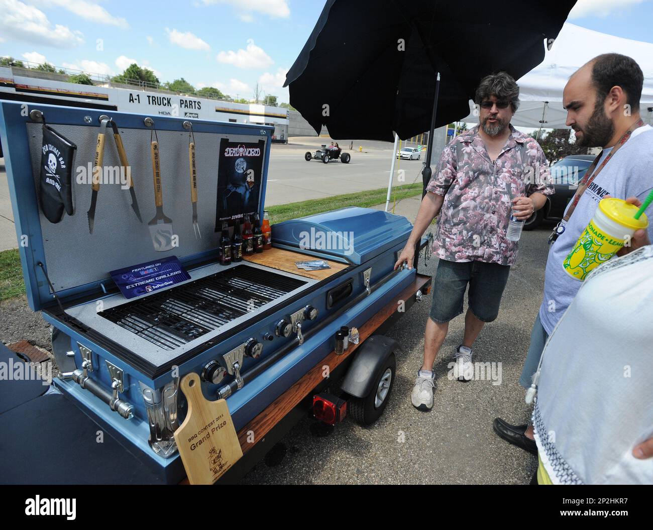 Nightmare Cruisers hearse club president Steve Frey, left, shows off ...