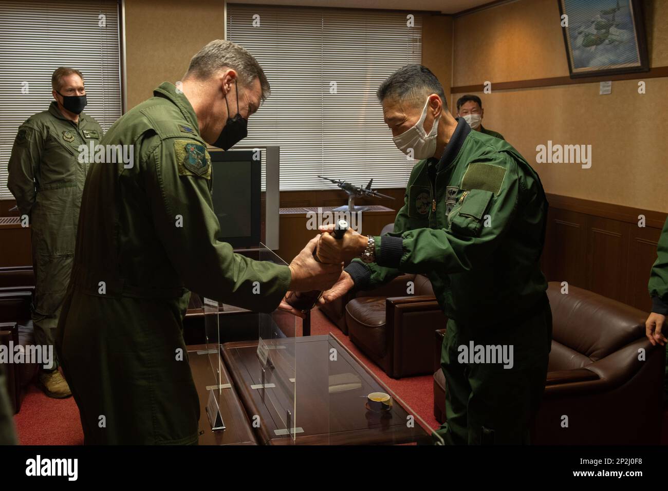 Japan Air Self Defense force Maj. Gen. Takuya Watanabe, right, Komaki ...