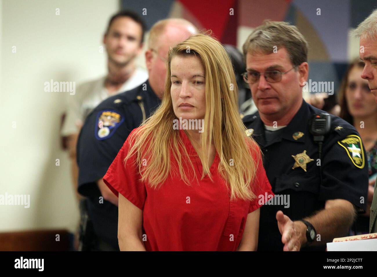 Jody Herring is led out of court after her arraignment in Vermont ...