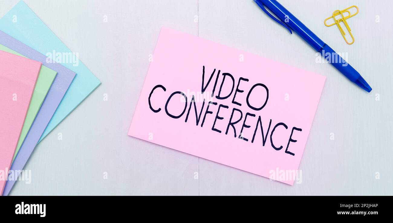 Hand writing sign Video Conference. Concept meaning people in remote ...