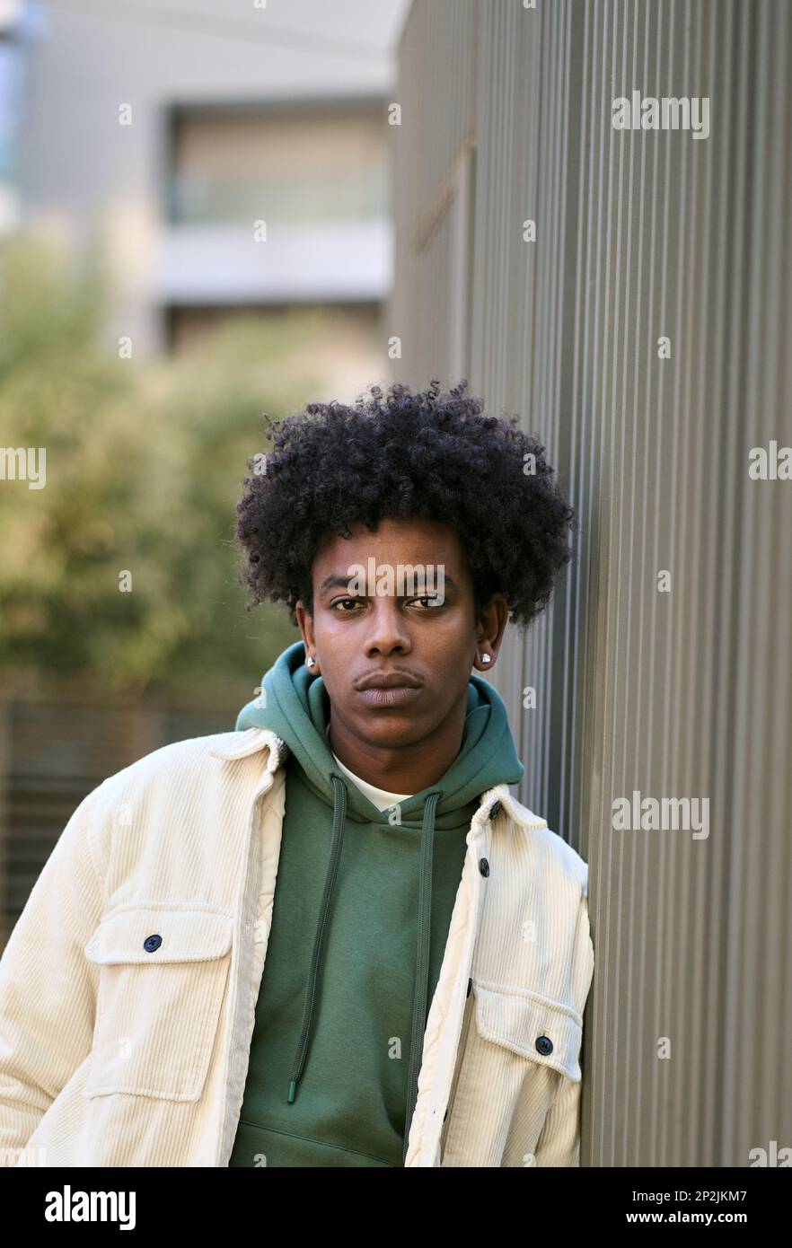 Cool stylish young gen z hipster African American guy outdoors ...