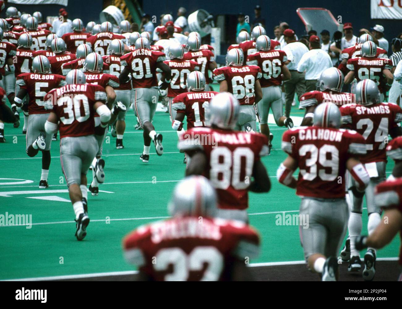 Ohio State University players run on the field at the Meadowlands in ...