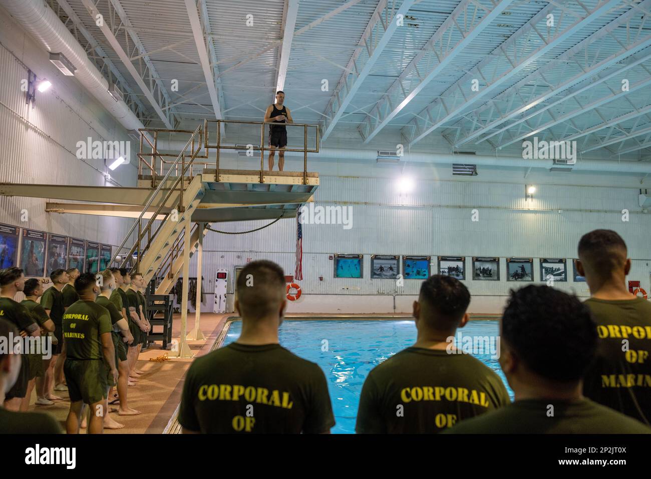 U.S. Marines with Marine Corps Base Quantico, listen to a brief from a ...