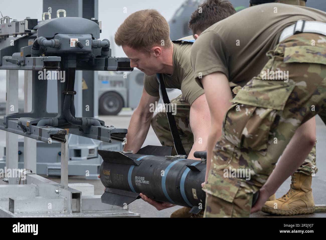 From left, U.S. Air Force Staff Sgt. Tanner Caufield and Airman 1st ...