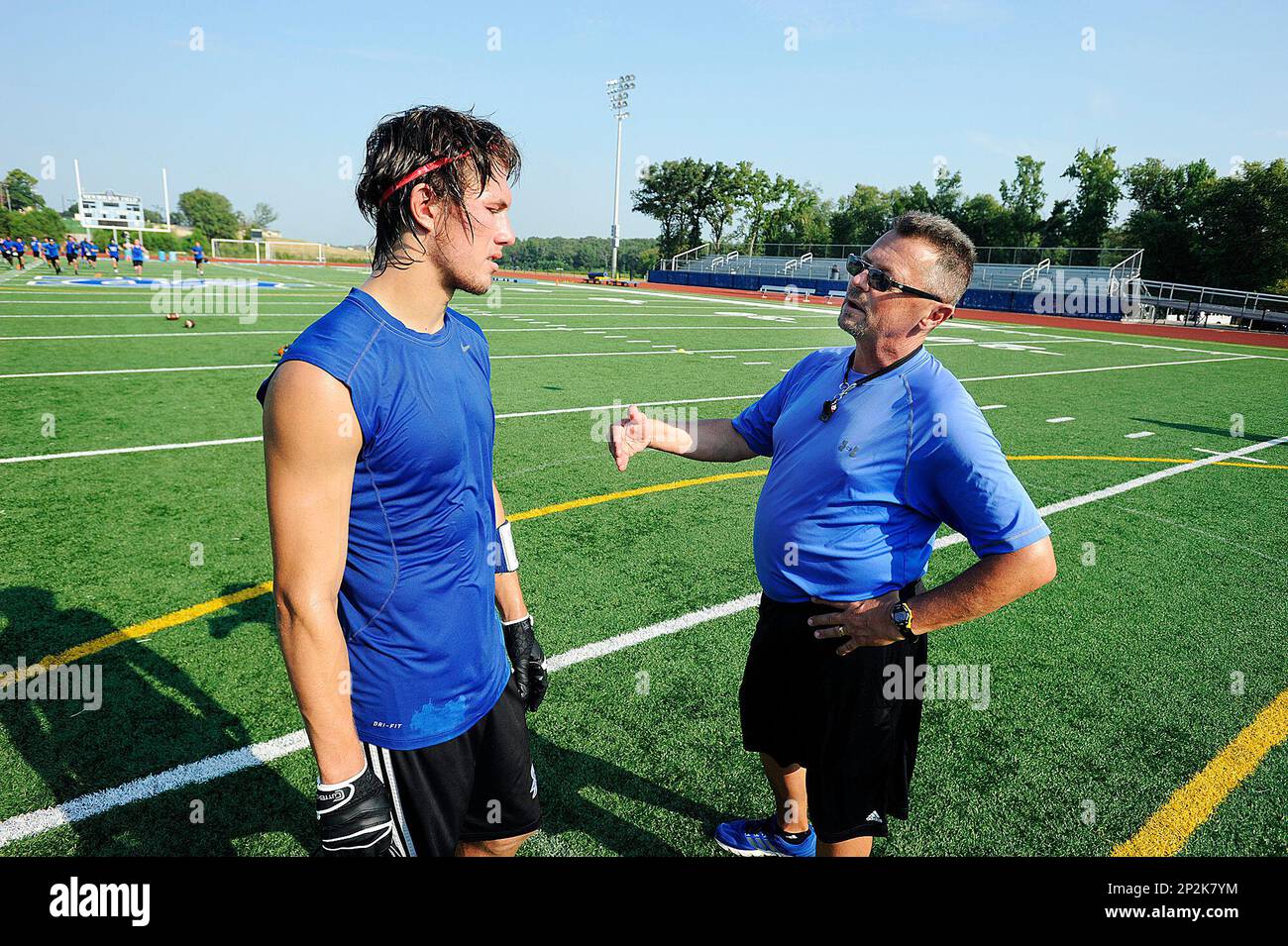 All Saints Episcopal School wide receiver and linebacker Luke Lee, left ...