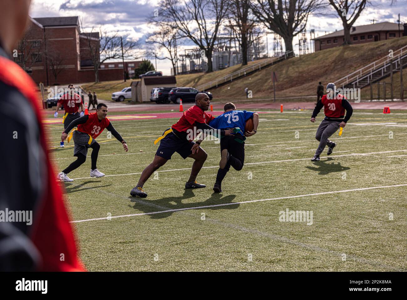 U.S. Marines and Sailors with Marine Corps Recruiting Command play flag ...