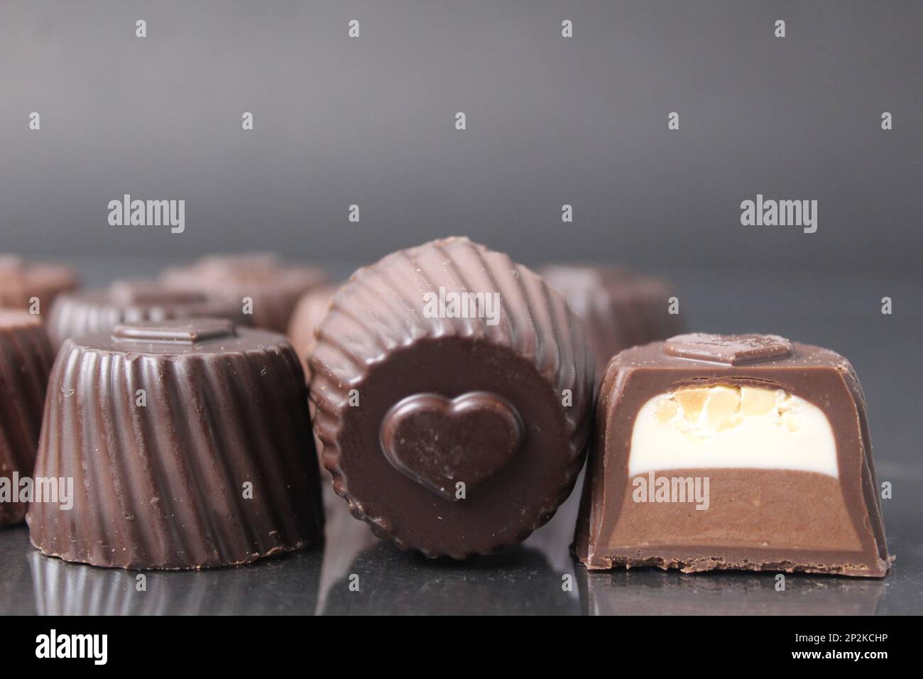 chocolate case candy in section with filling chocolate vanilla mousse ...