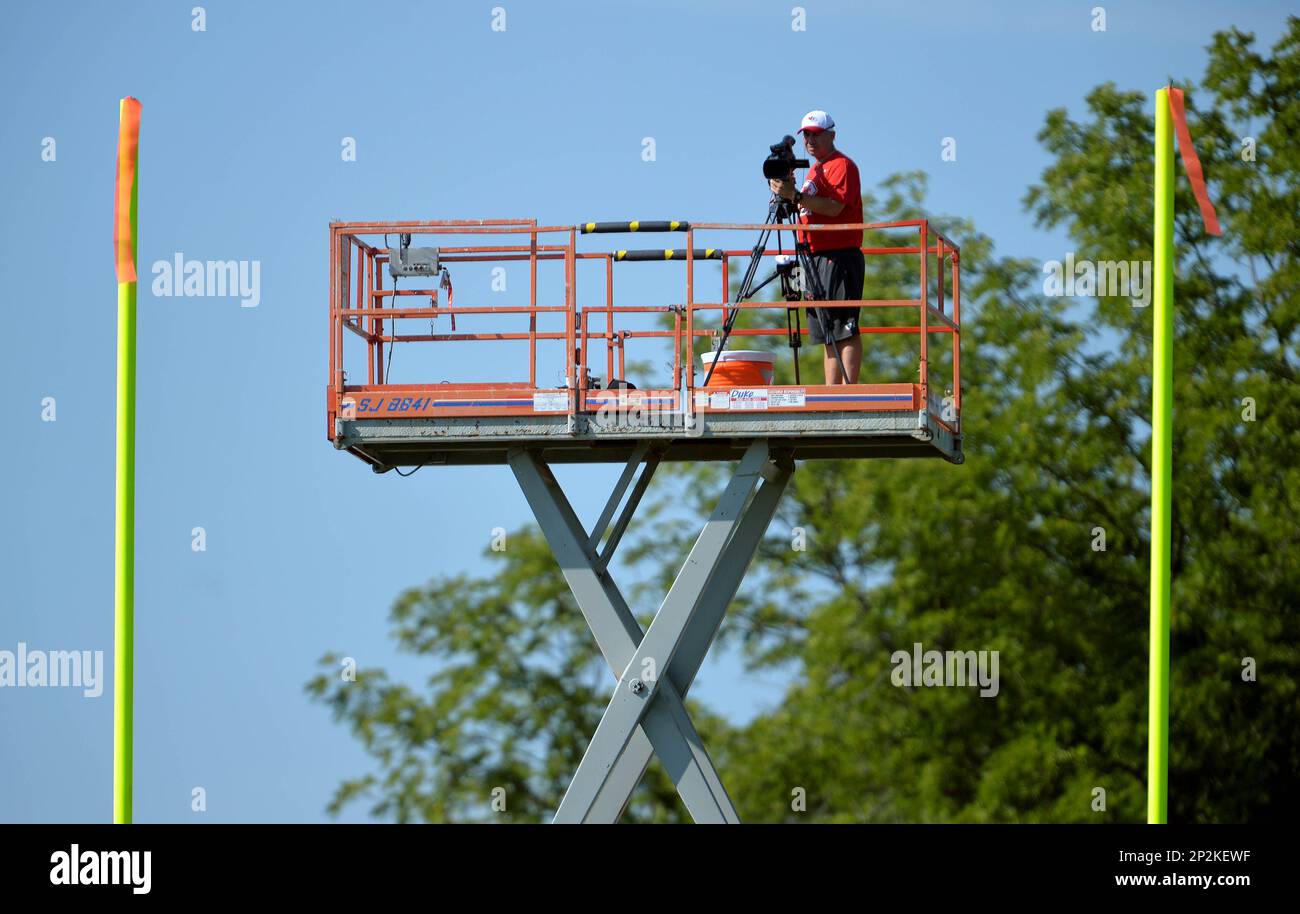 A cameraman is perched atop a scissor lift during a Kansas City Chiefs ...