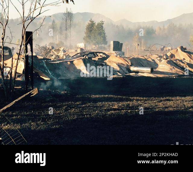 This photo provided by Mason Co. Sheriff's Office, debris and a ...