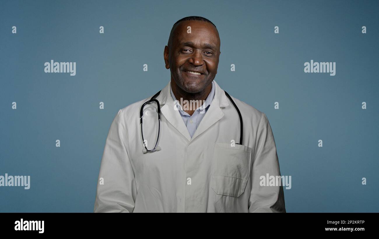 Doctor in uniform takes off hi-res stock photography and images - Alamy