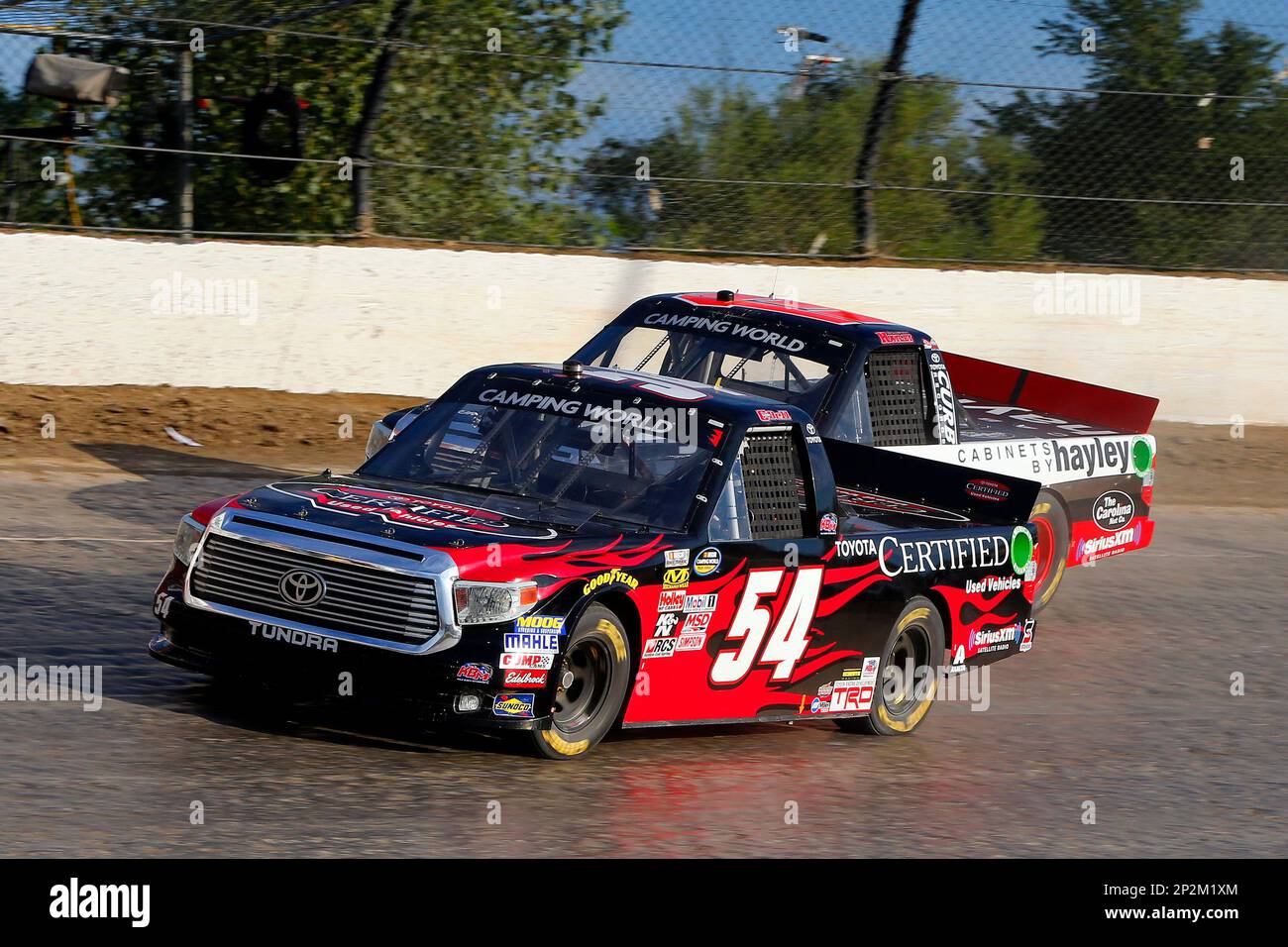Christopher Bell (54) and Cameron Hayley (13) during heat races for the ...