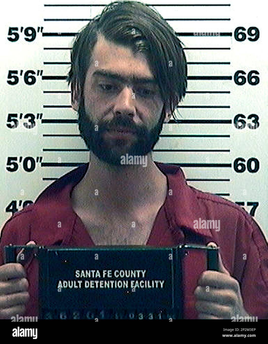 FILE - This undated booking photo provided by the Santa Fe County Adult ...