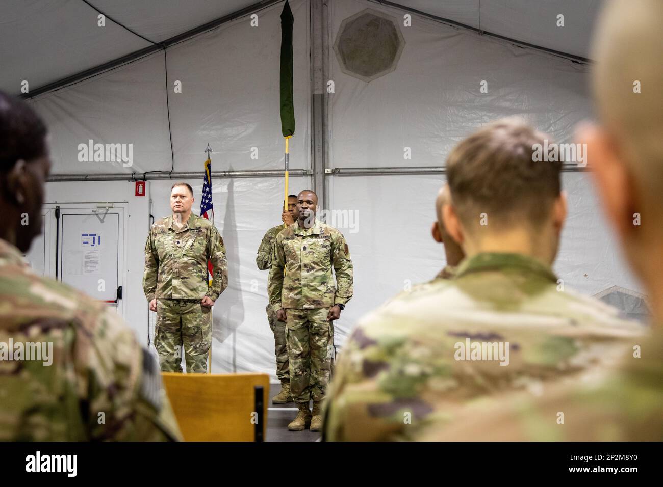 U.S. Army Lt. Col. John C. Hatley, left, commander of Headquarters and ...