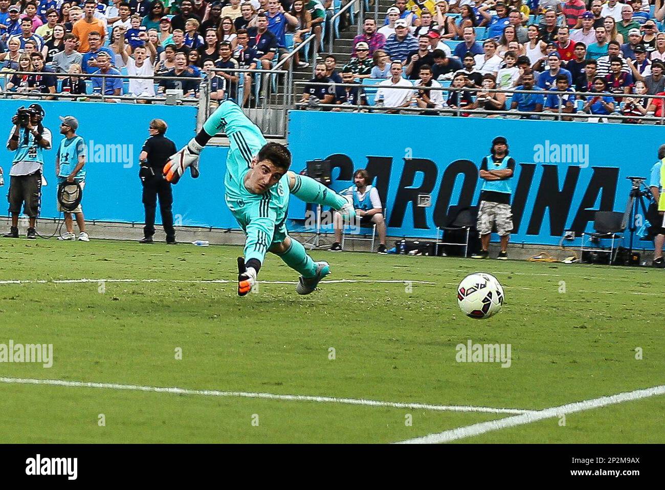July 25, 2015: Chelsea goalkeeper Thibaut Courtois (13) dives for a ...