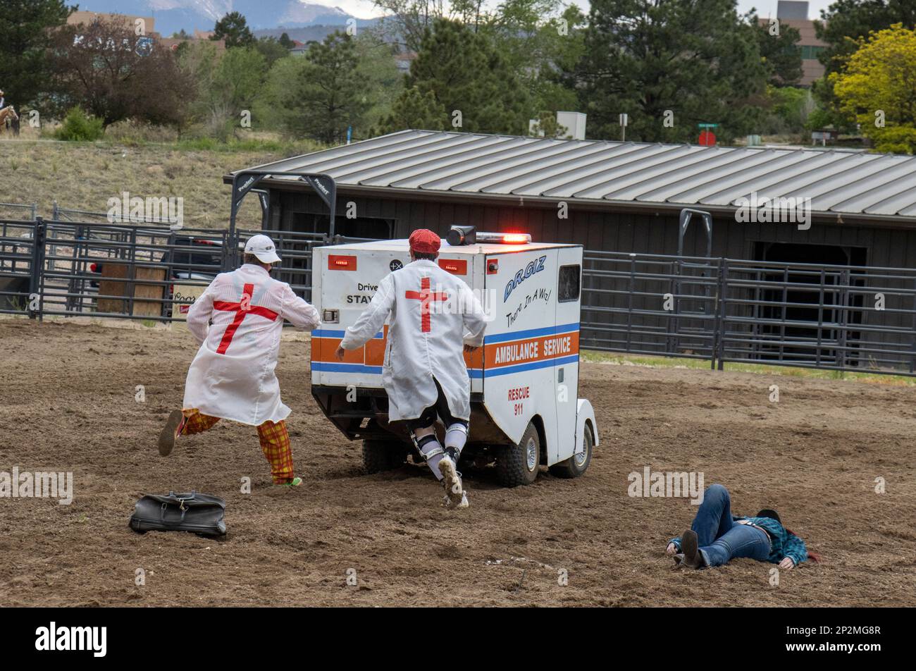 Rodeo clowns and their version of an ambulance during rodeo at Colorado ...