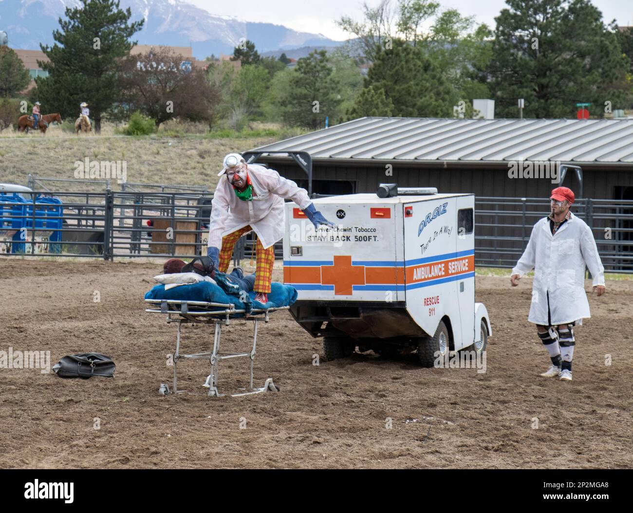 Rodeo clowns and their version of an ambulance during rodeo at Colorado ...