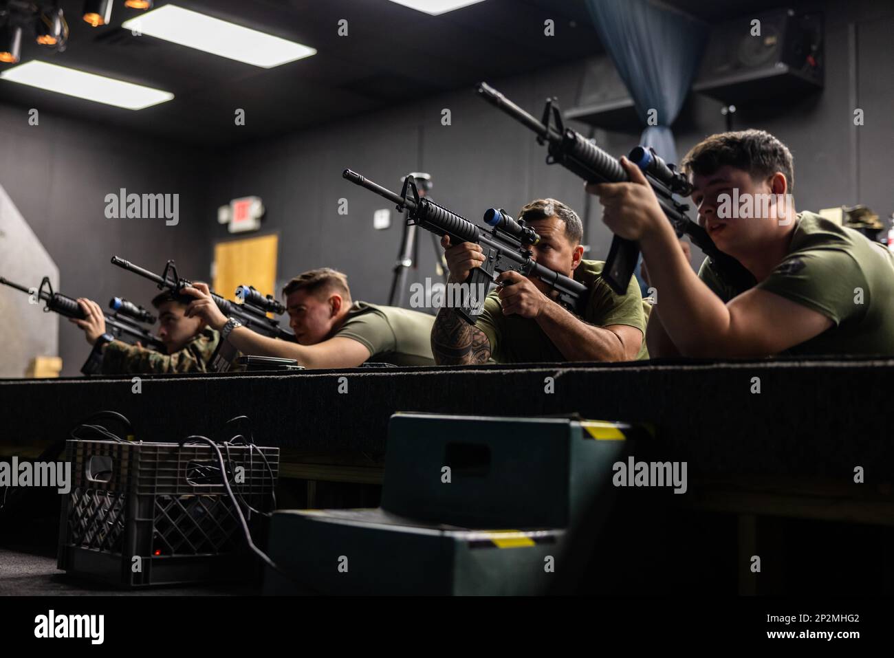 U.S. Marines with Security Battalion shoot an M4 rifle at the Indoor ...
