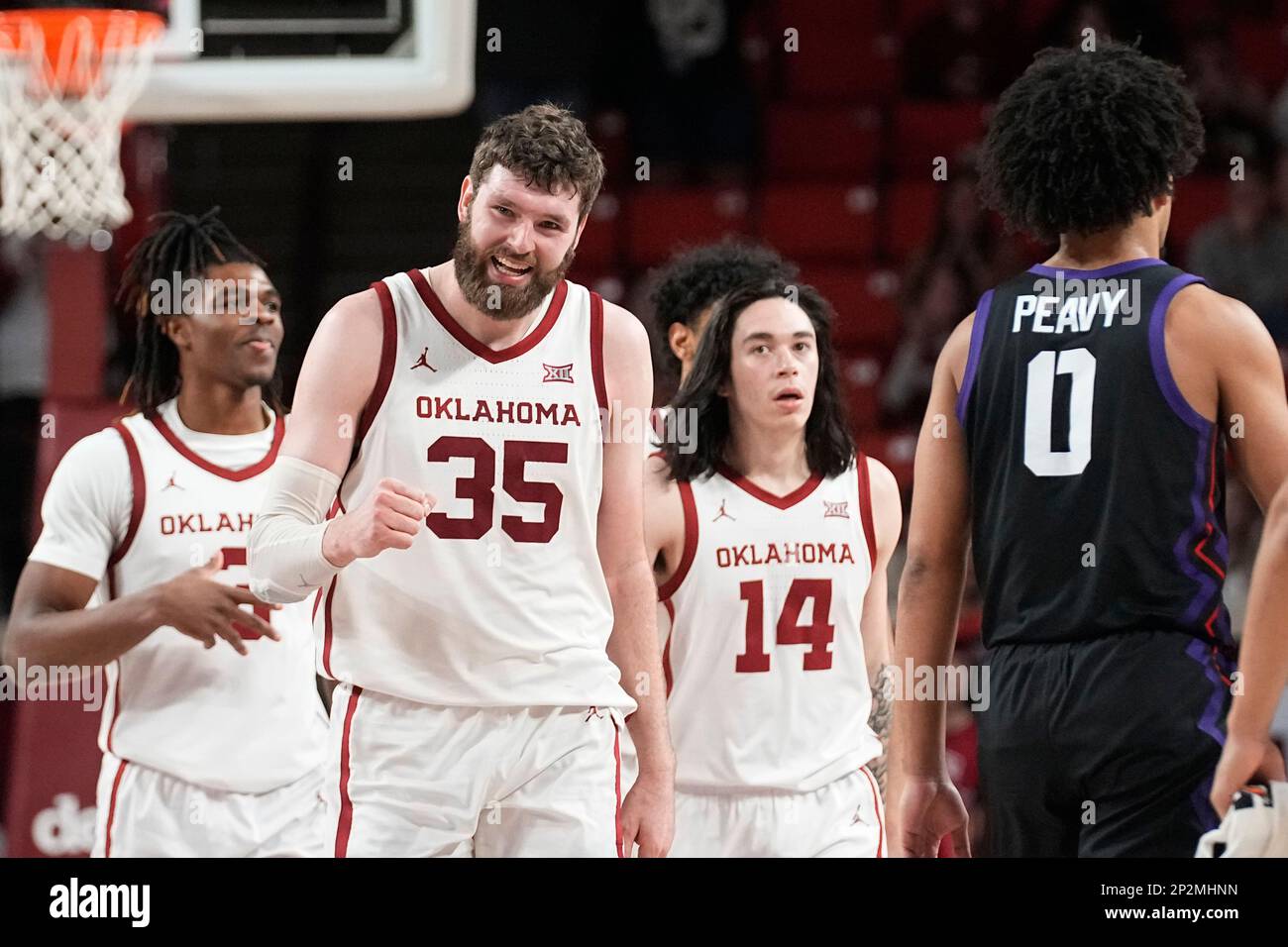 Oklahoma forward Tanner Groves (35) pumps his fist as he walks off the ...