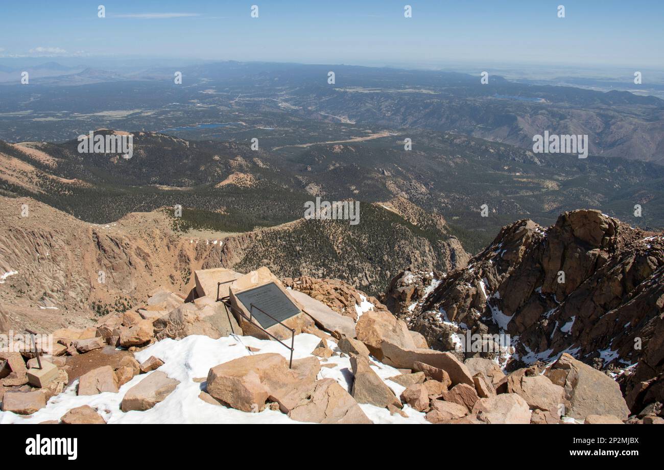 View from the top of Pikes Peak in Colorado. USA with plaque honoring ...