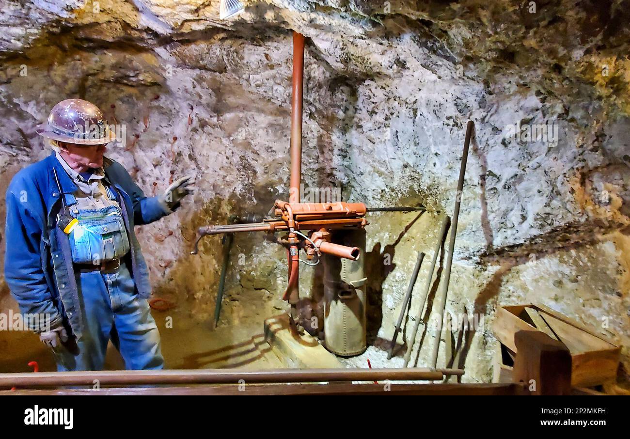 Guide points out mining equipment during tour of Mollie Kathleen Gold ...