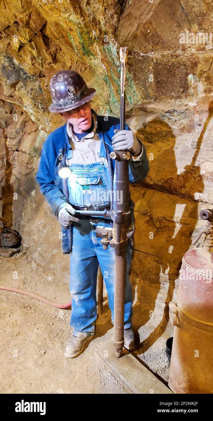 Guide points out mining equipment during tour of Mollie Kathleen Gold ...