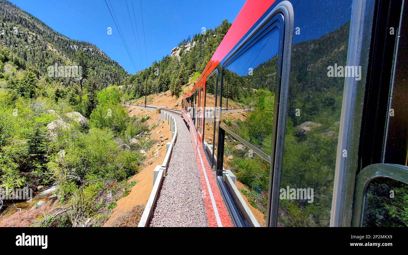 View from the cog railway train going up to the top of Pike's Peak ...
