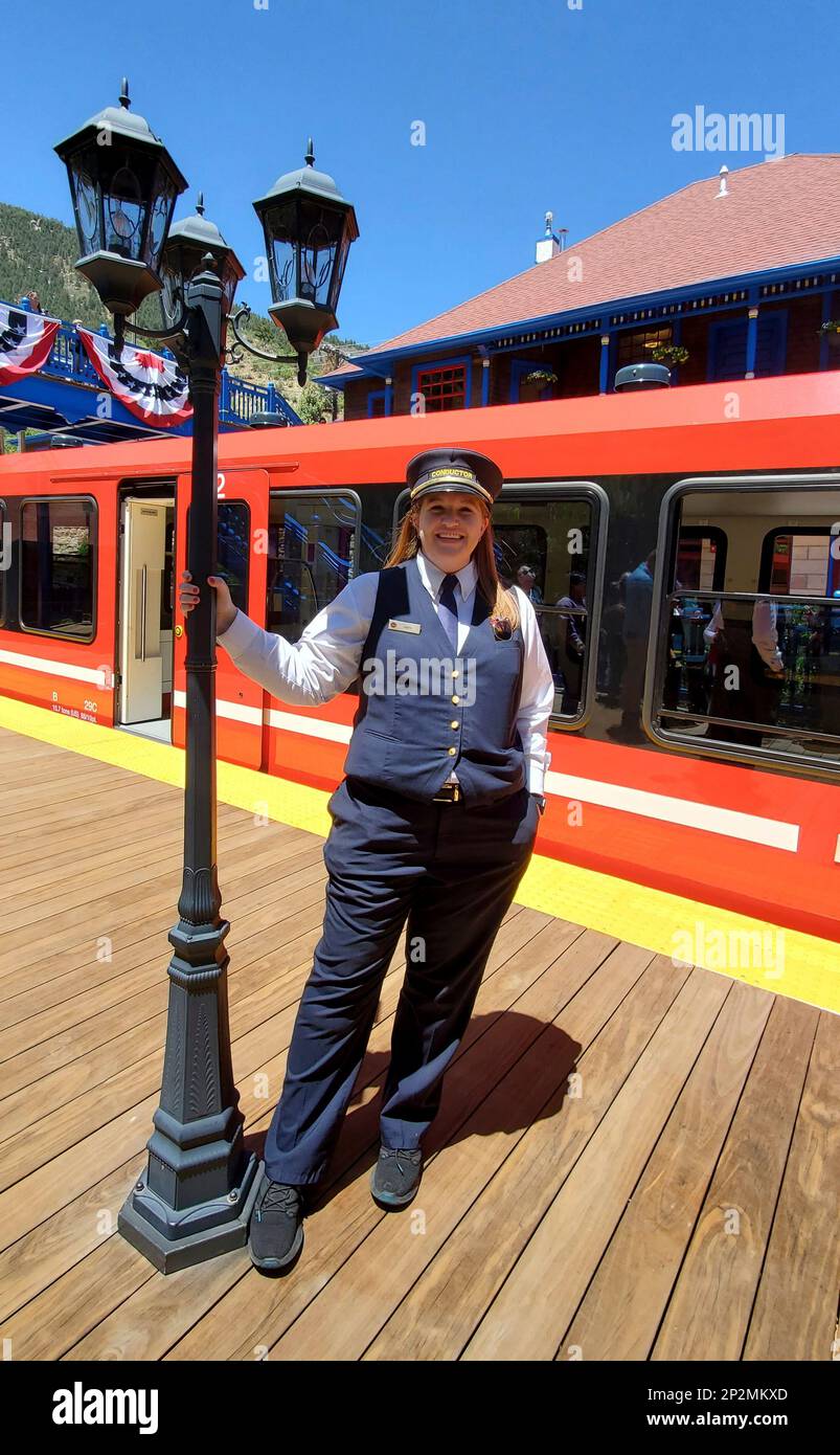 Conductor at the station for the cog railway going up to the top of ...