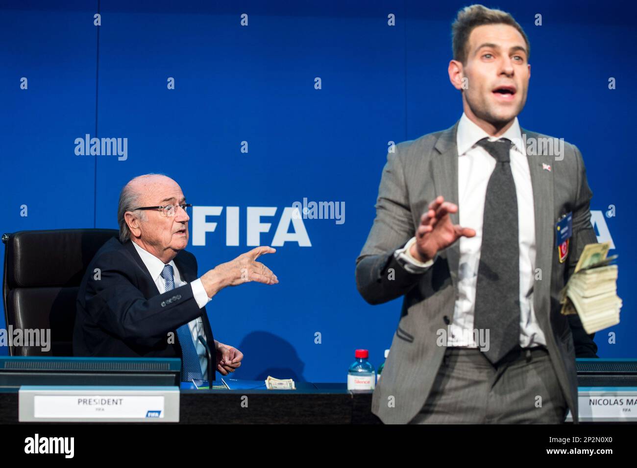 FIFA president Sepp Blatter, left, reacts, next to British comedian ...