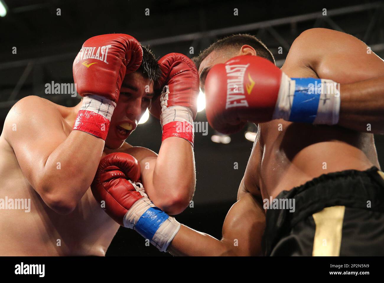 Daniel Rosario of Puerto Rico (R) fights against Aaron Garcia for the ...