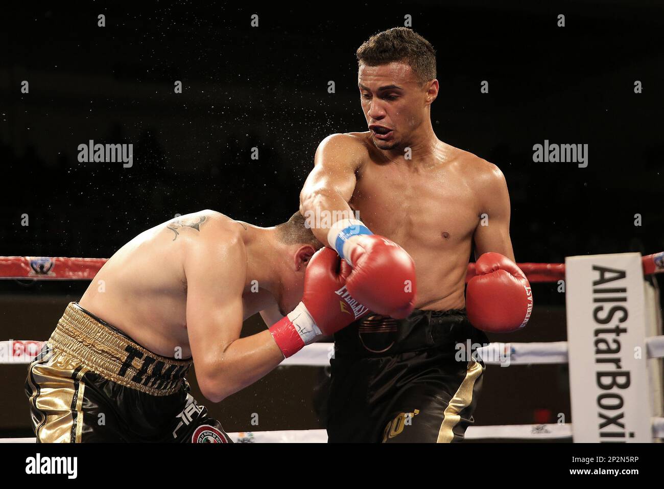 Daniel Rosario of Puerto Rico (R) fights against Aaron Garcia for the ...