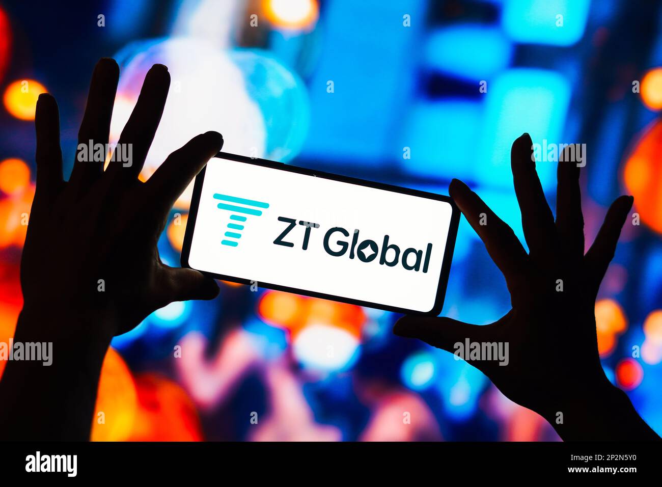 In this photo illustration, the ZT Global logo seen displayed on a ...