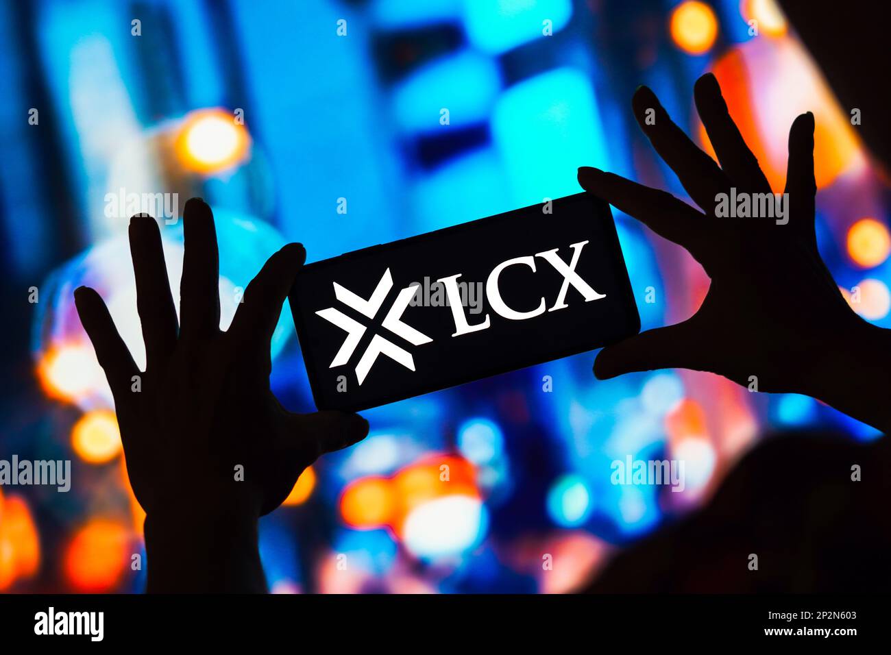In this photo illustration, the LCX Exchange logo seen displayed on a ...