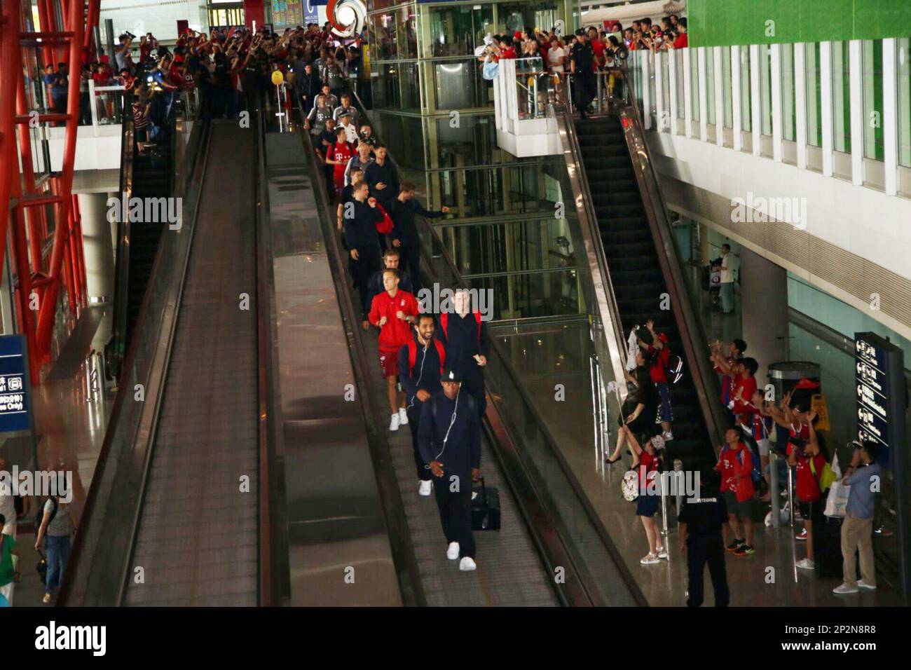 Team members of Bayern Munich FC arrive at the Beijing Capital ...